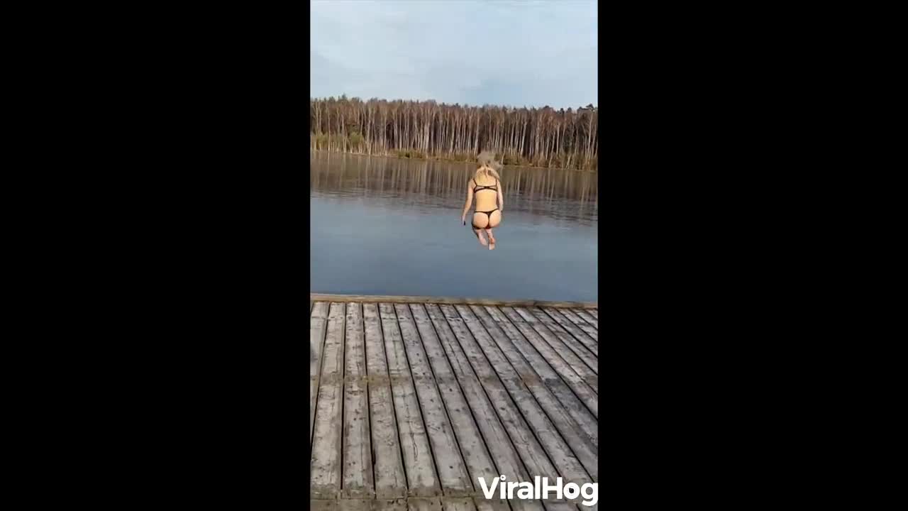 ViralHog: Icy Lake Jump Fail. Find clips on VLIPSY